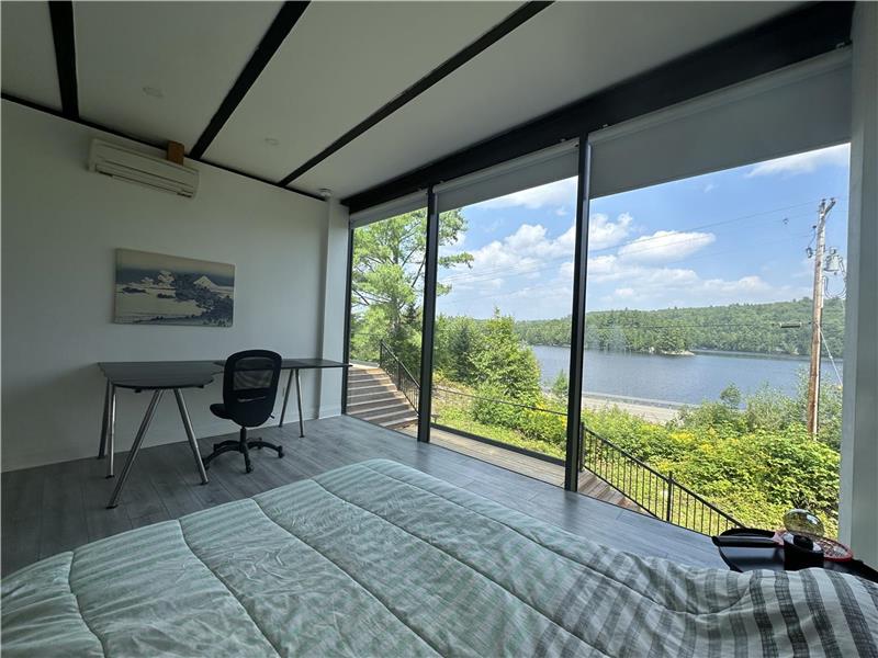 Modern Glass Cottage facing a Lake - Algonquin Highlands Cottage Rental ...